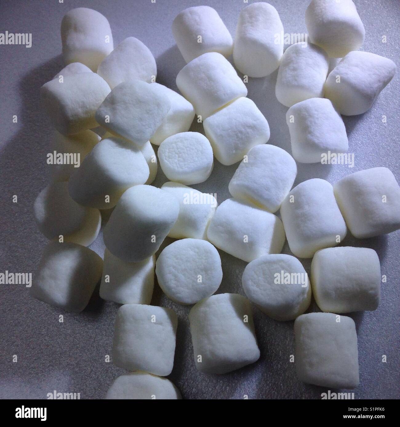 Abstract view of white marshmallows on a white background Stock Photo ...