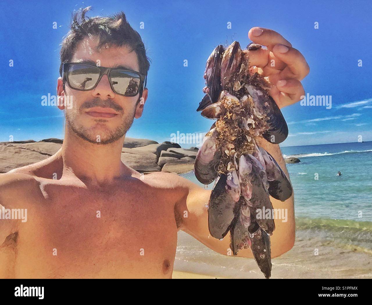 Mussels man hi-res stock photography and images - Alamy