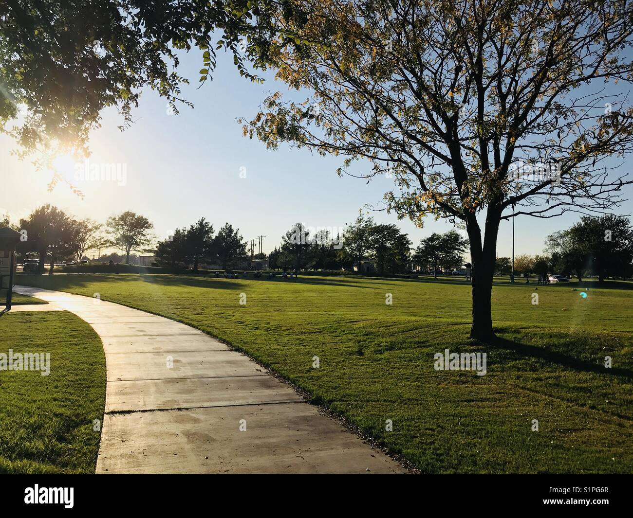 Sun park walkway hi-res stock photography and images - Alamy