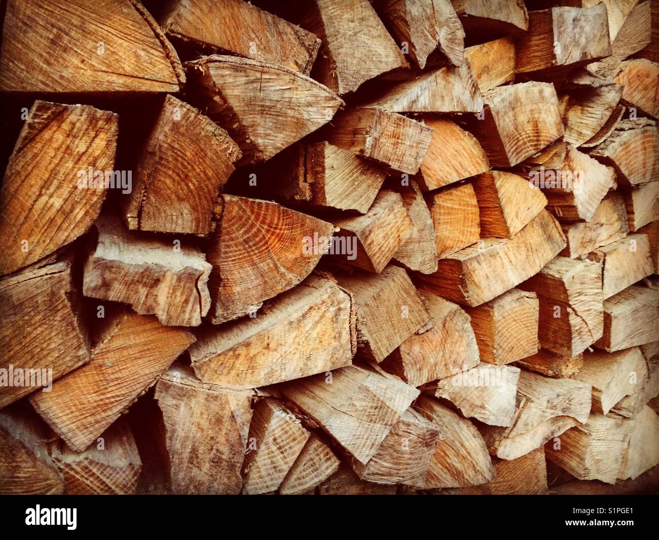 Firewood for a long and hard winter season Stock Photo - Alamy