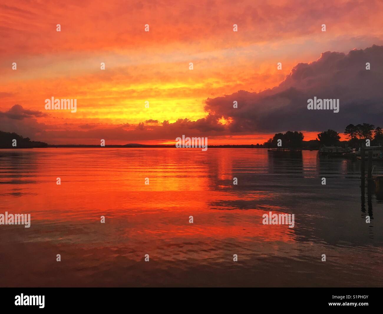 Sunset on the lake Stock Photo - Alamy