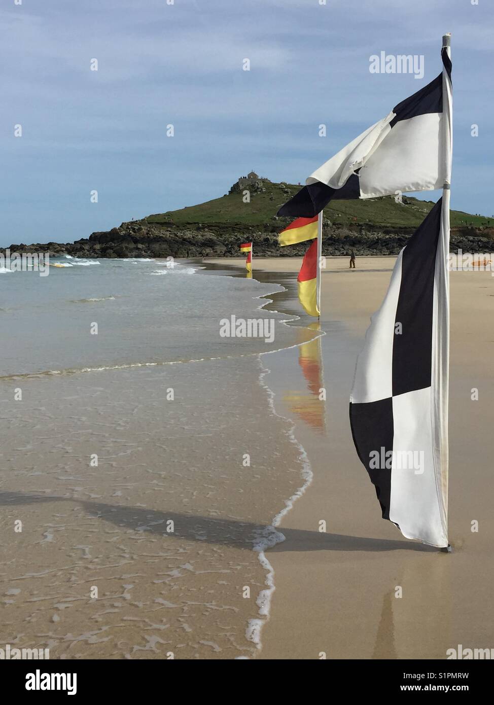 Warning flags for swimmers and surfers at Porthmeor beach St Ives ...