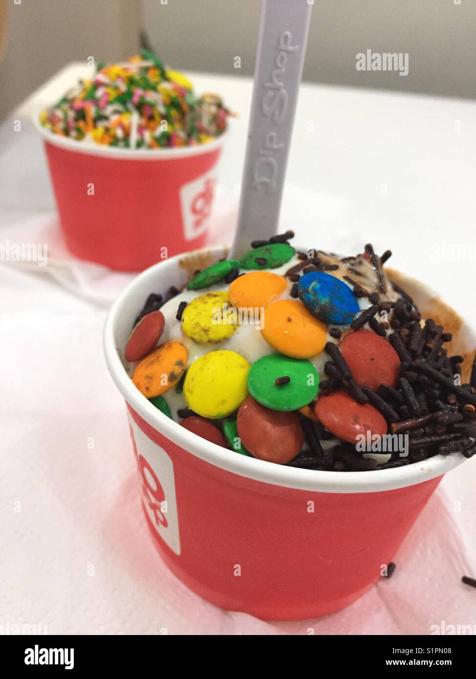 Ice cream with colorful toppings Stock Photo - Alamy
