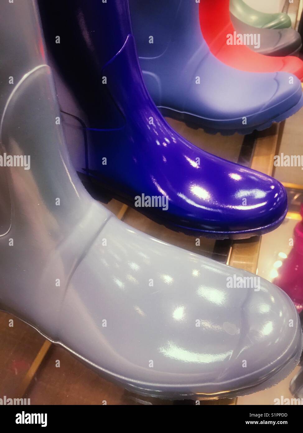 Row rubber boots hi-res stock photography and images - Alamy