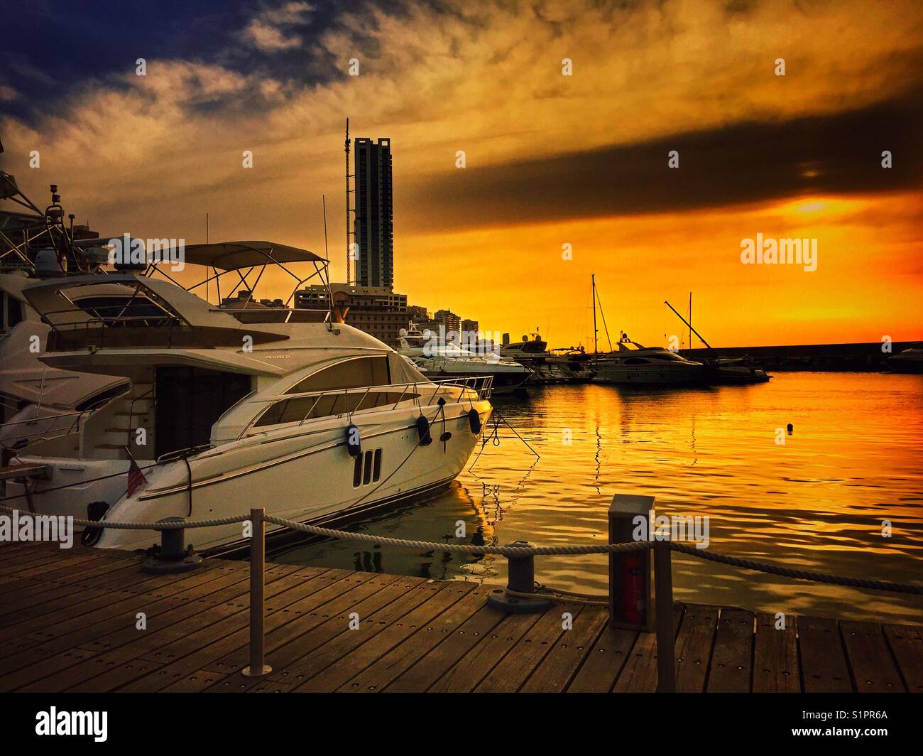 Sunset at marina Stock Photo - Alamy