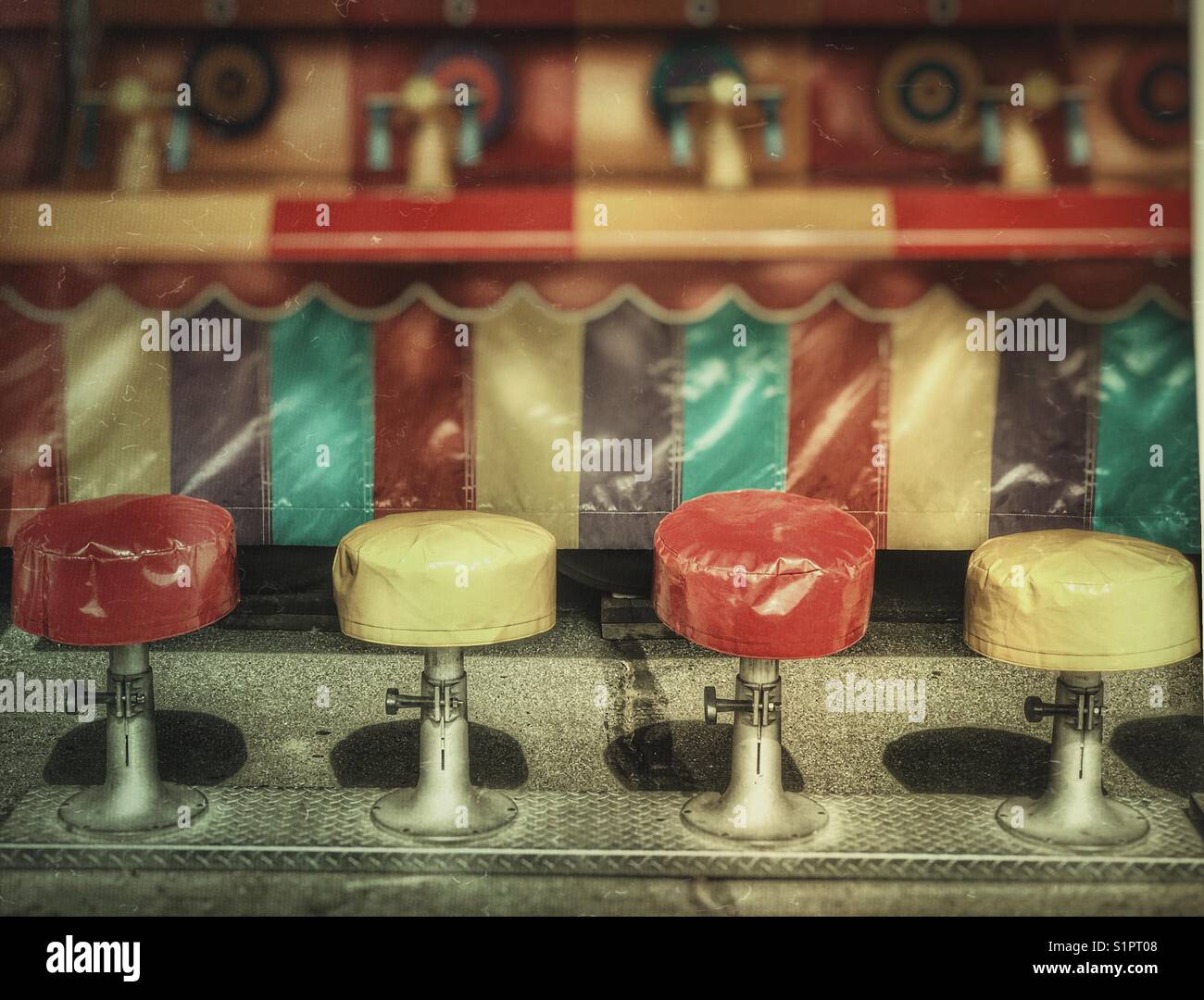 Water pistol game at county fair Stock Photo - Alamy