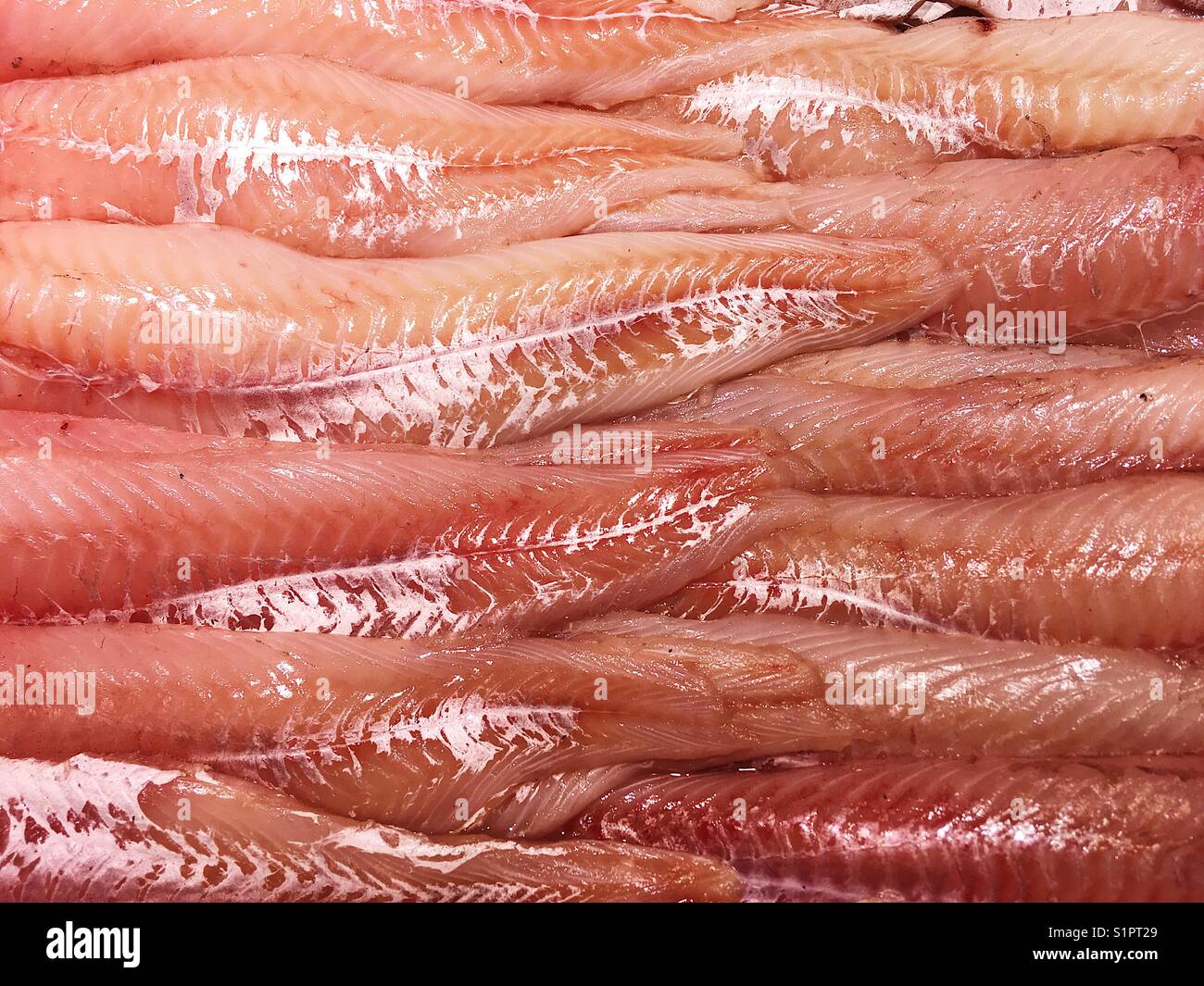 Apstract rosy fish fillet pattern photography Stock Photo - Alamy