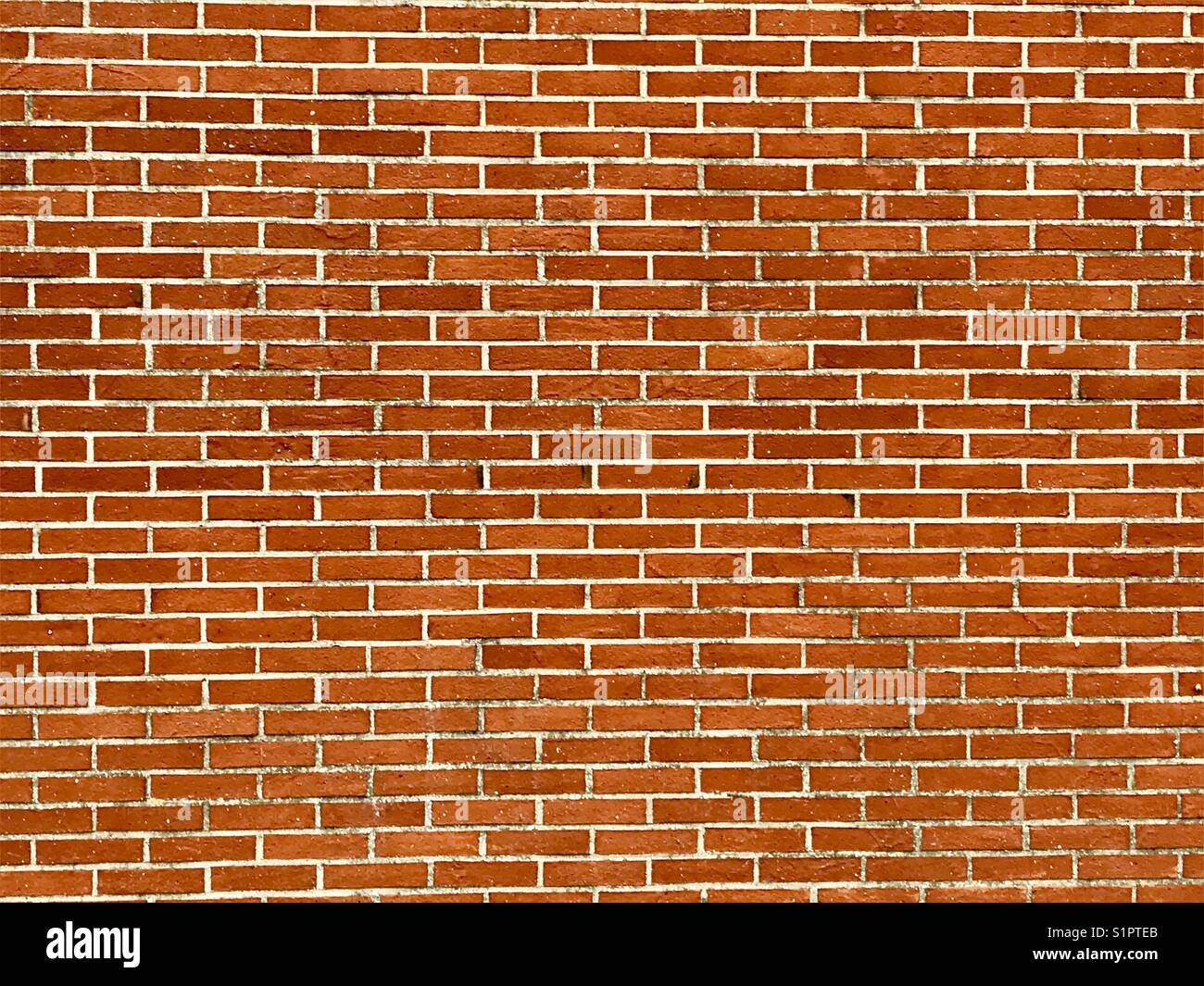 Red background bricks hi-res stock photography and images - Alamy