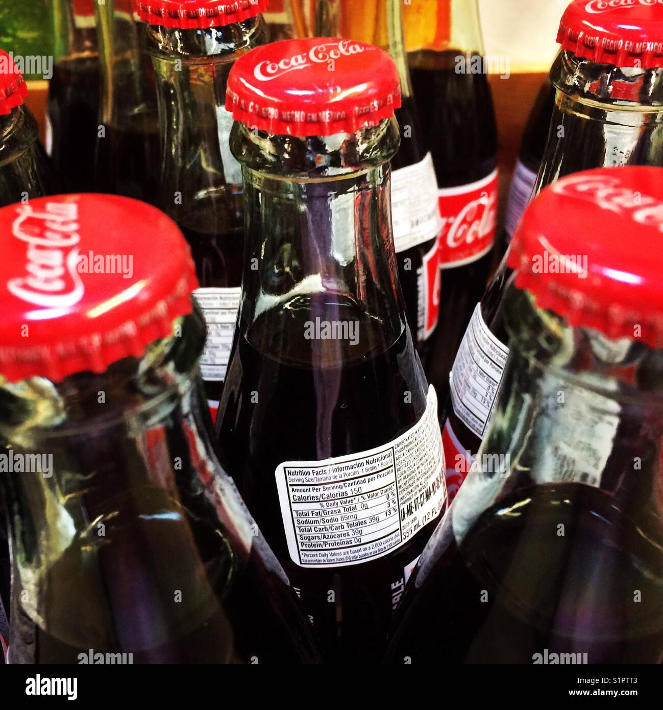 Coke bottles in a grocery store Stock Photo - Alamy