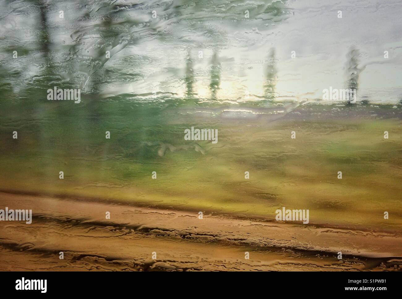 Train window rain hi-res stock photography and images - Alamy