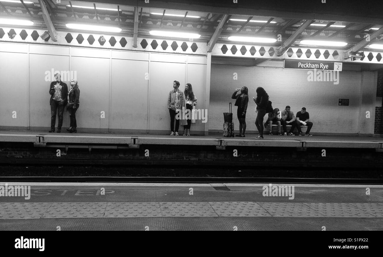 Platform at overground station Stock Photo - Alamy
