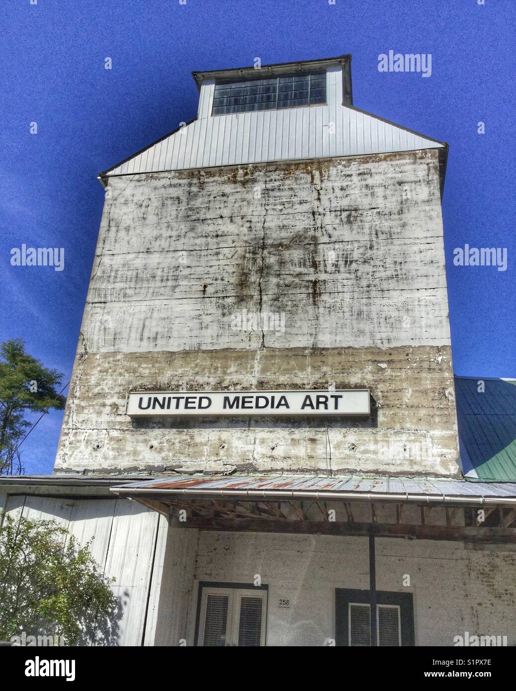 An old grain building converted into an art centre Stock Photo - Alamy