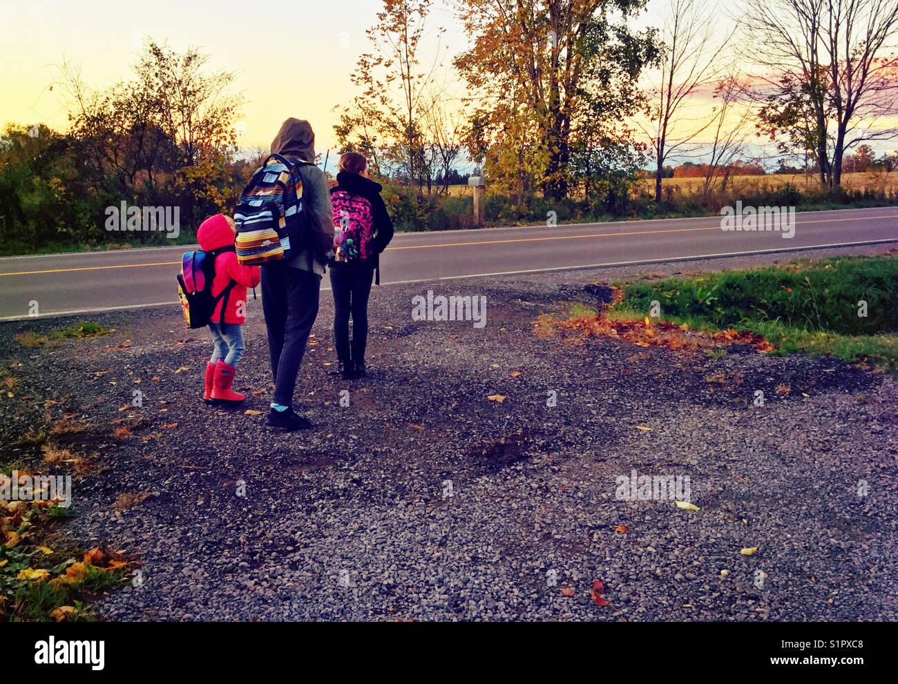 Kids waiting for bus hi-res stock photography and images - Alamy