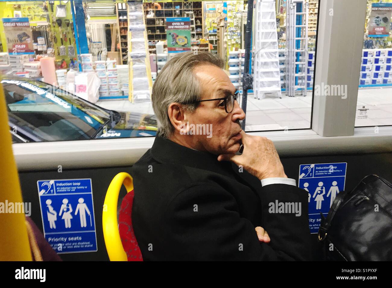 Old man on the bus, London Stock Photo - Alamy