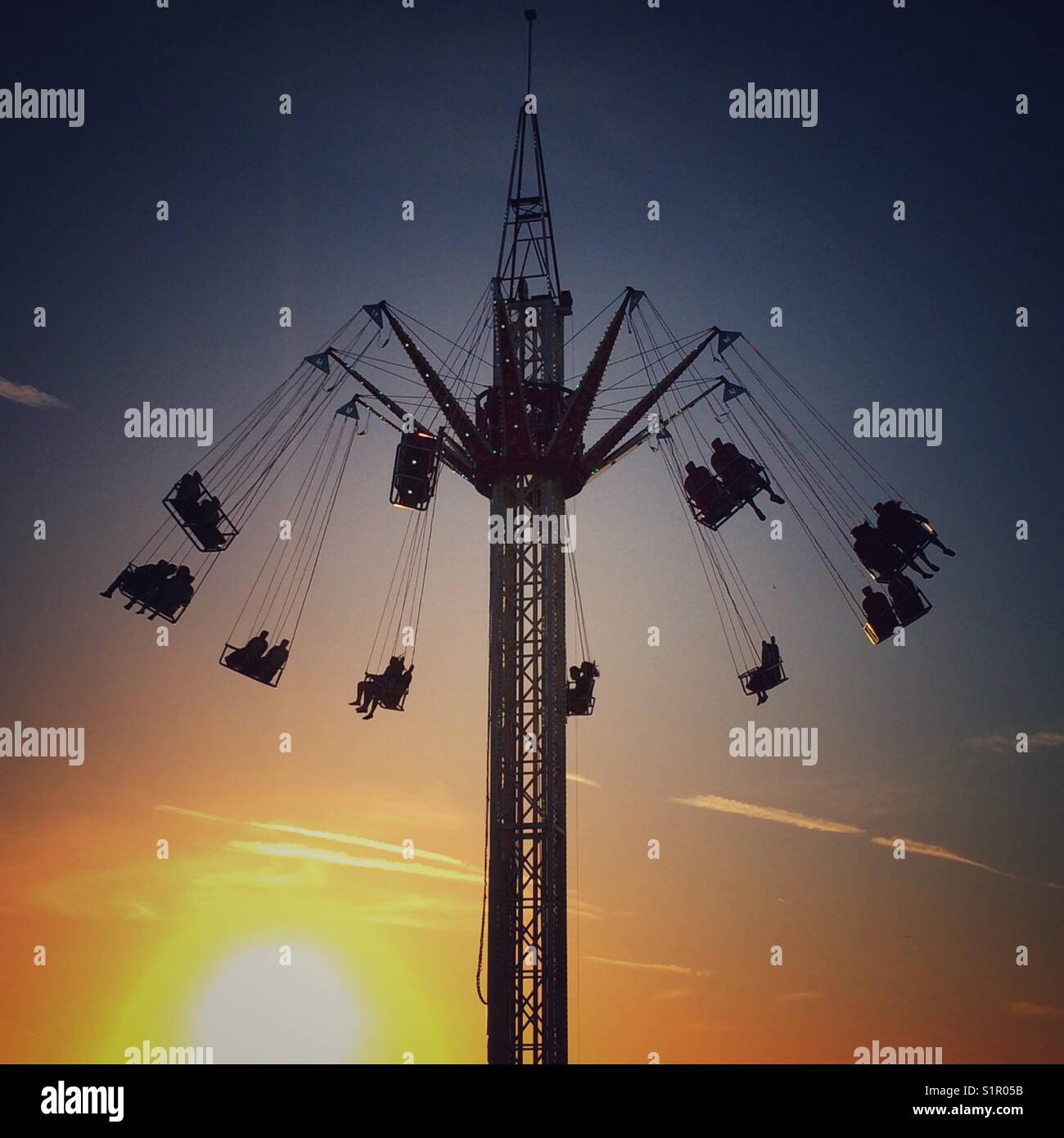 Roundabout swing hi-res stock photography and images - Alamy