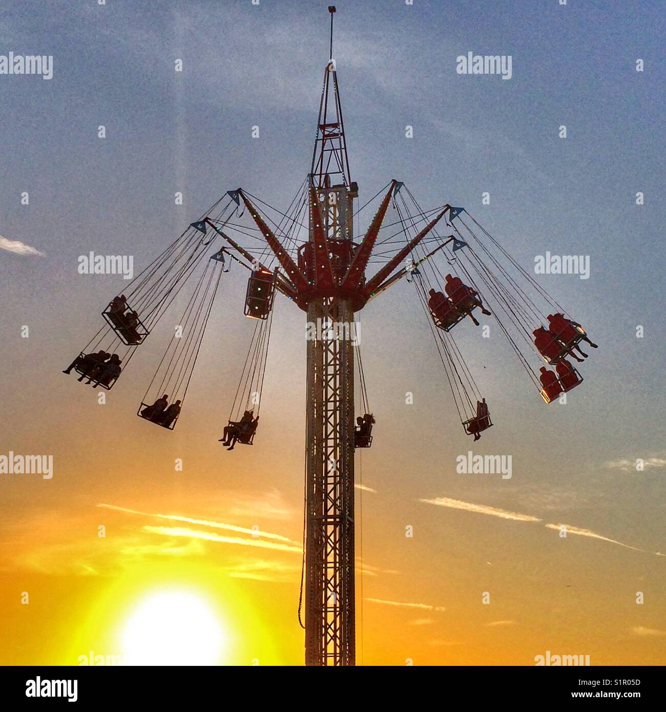 Roundabout swing hi-res stock photography and images - Alamy