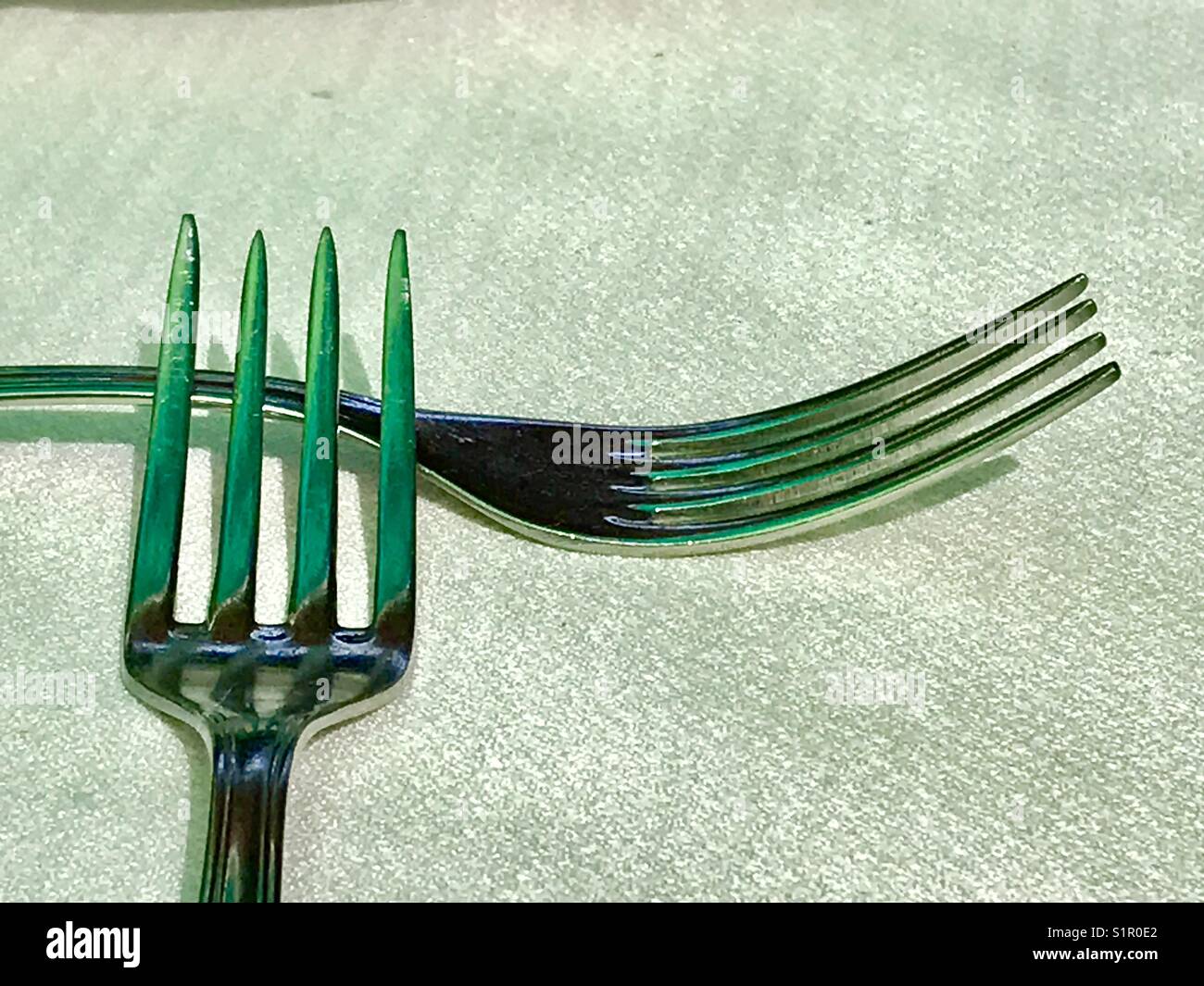 Crossing forks hi-res stock photography and images - Alamy