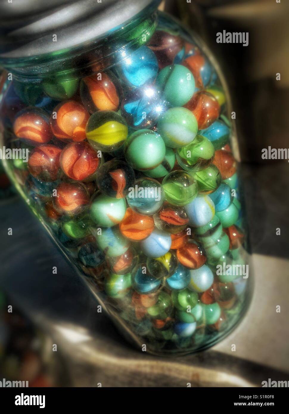 Jar of marbles hi-res stock photography and images - Alamy