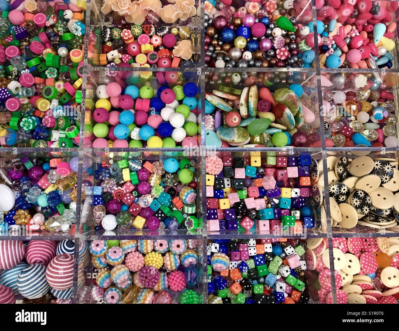 Coloured bead boxes Stock Photo - Alamy