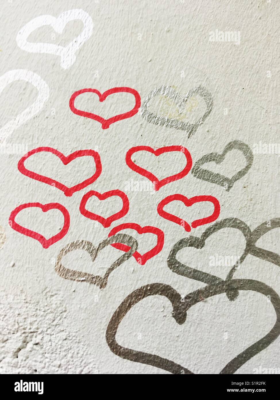 Silver and red graffiti hearts Stock Photo - Alamy