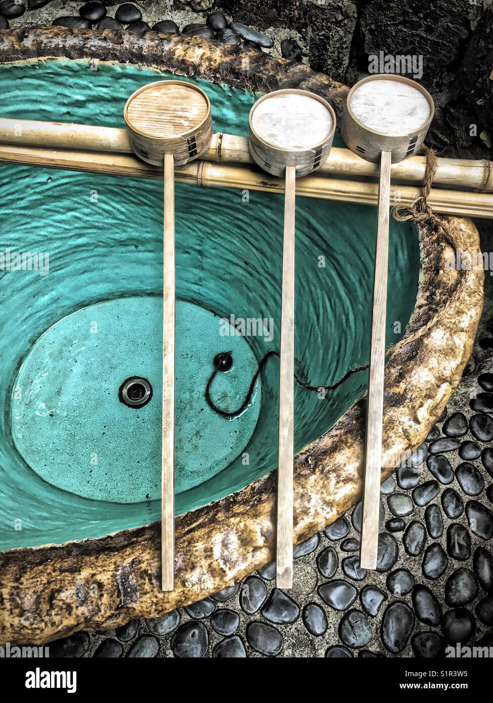 Chozubachi, water filled basin, and bamboo dippers used in the ...