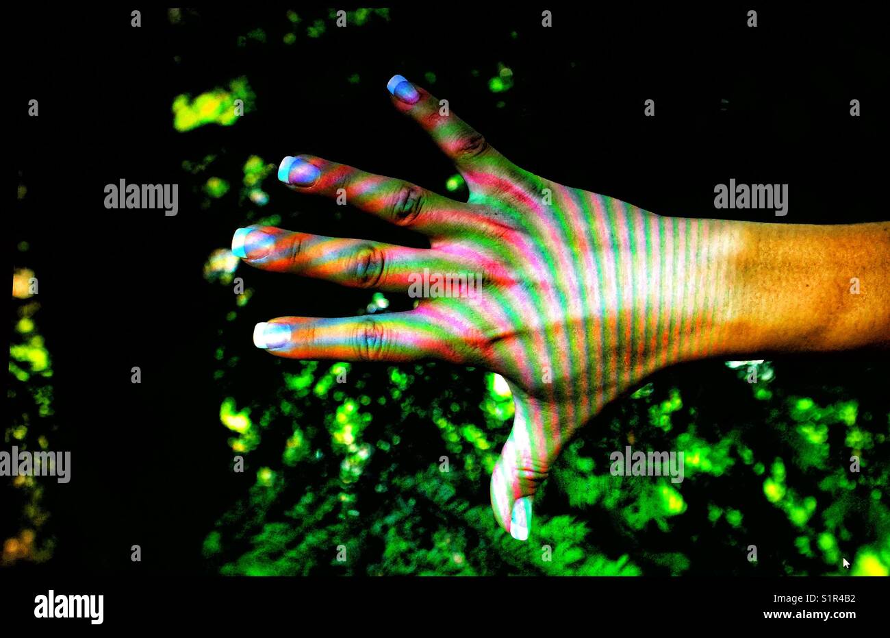 Colourful hand hi-res stock photography and images - Alamy