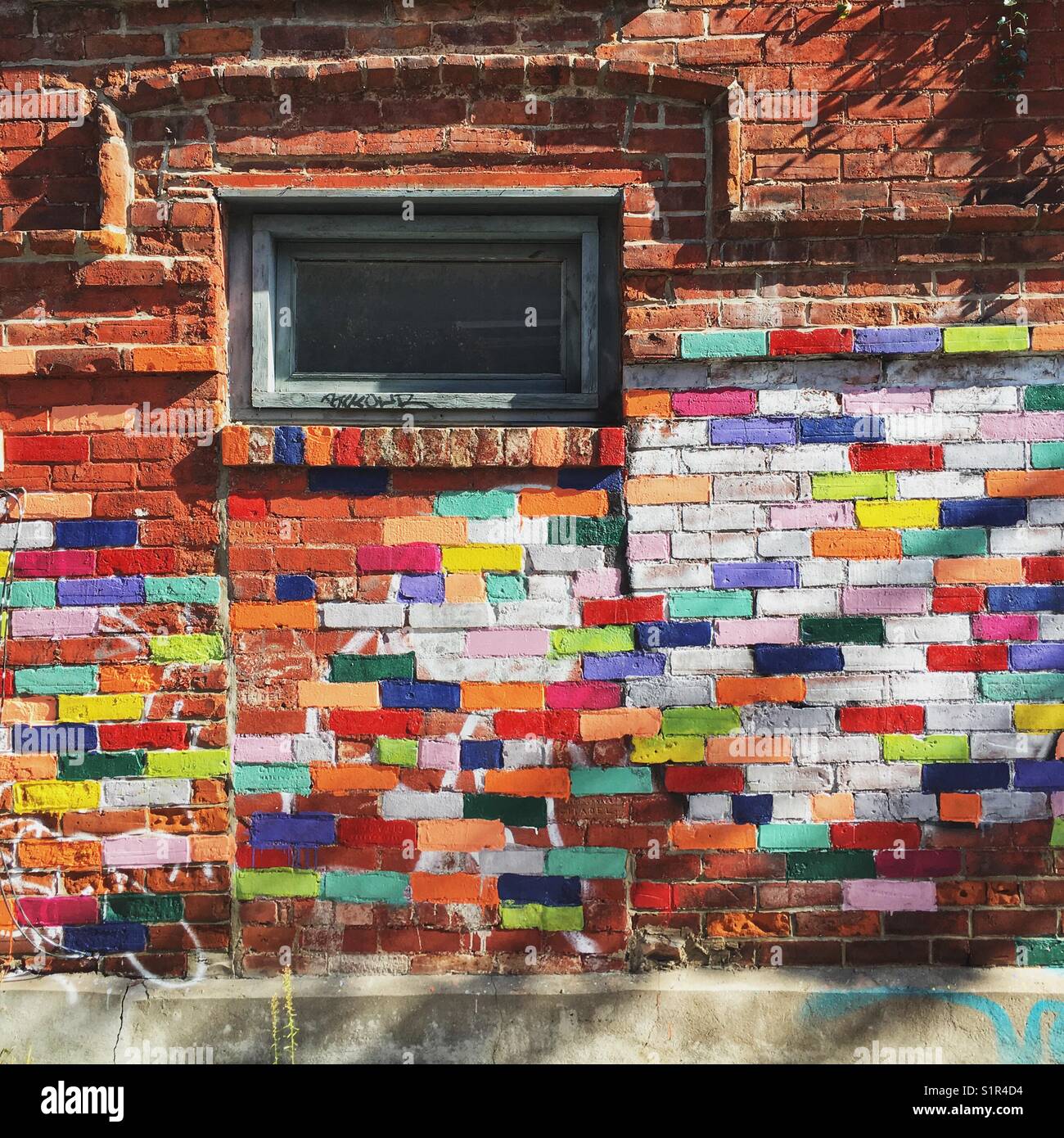Multi coloured brick wall hi-res stock photography and images - Alamy