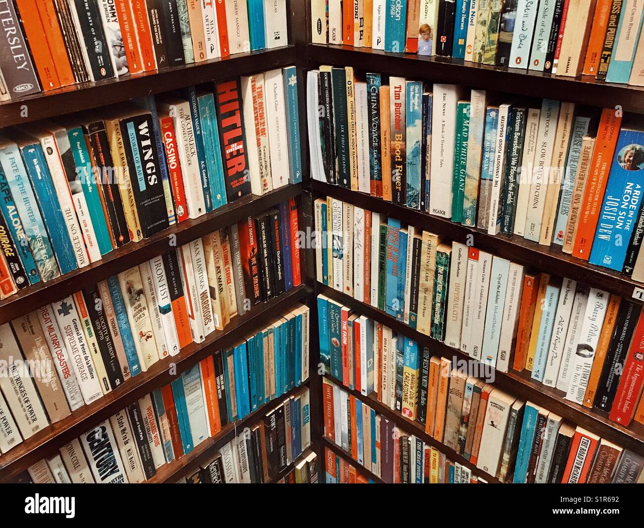 Used books close up hand hi-res stock photography and images - Alamy