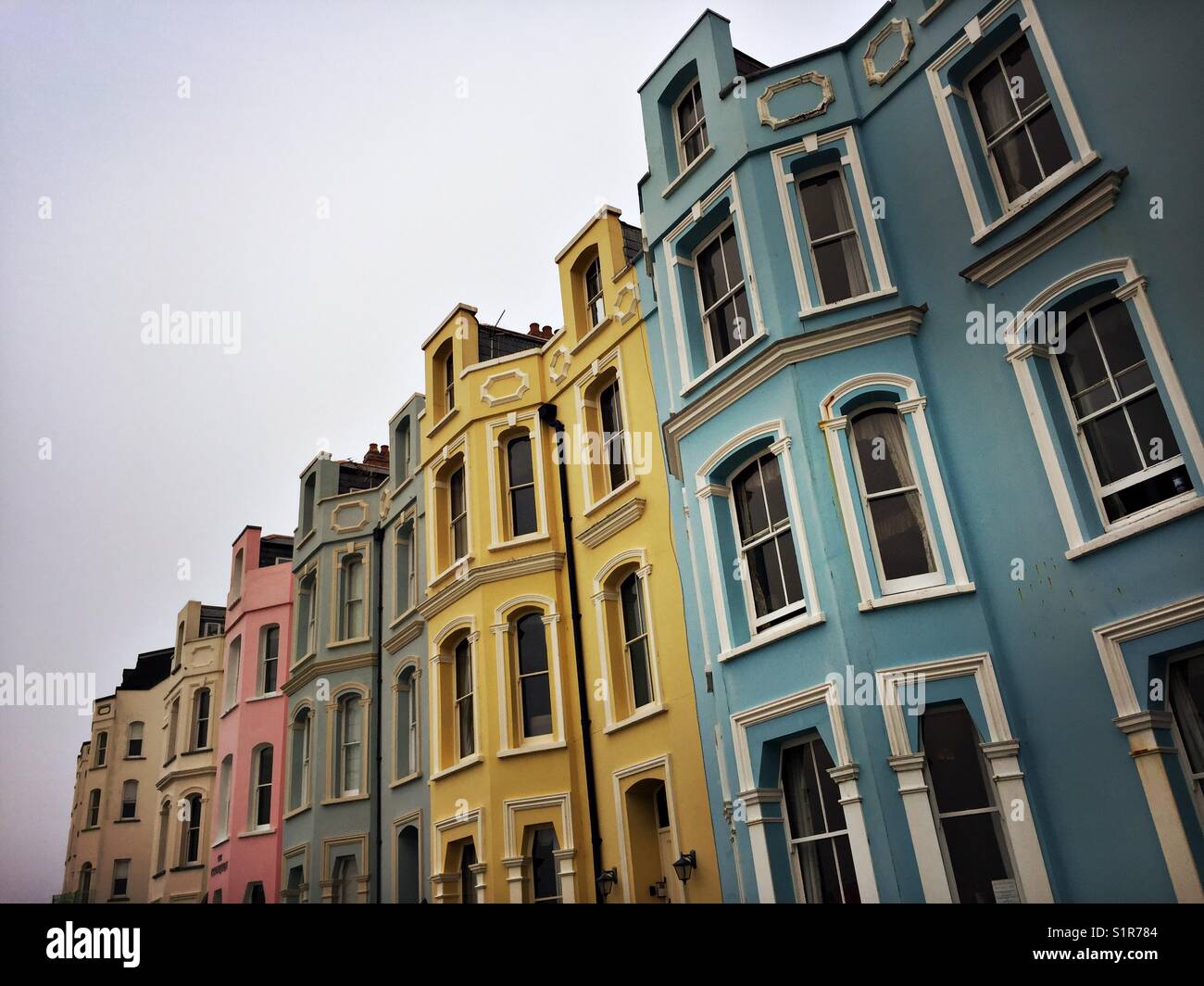 Houses painted in different colours in Tenby, Wales October 2017 Stock ...