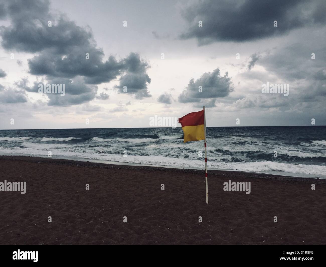 BEACH warning flag Stock Photo - Alamy