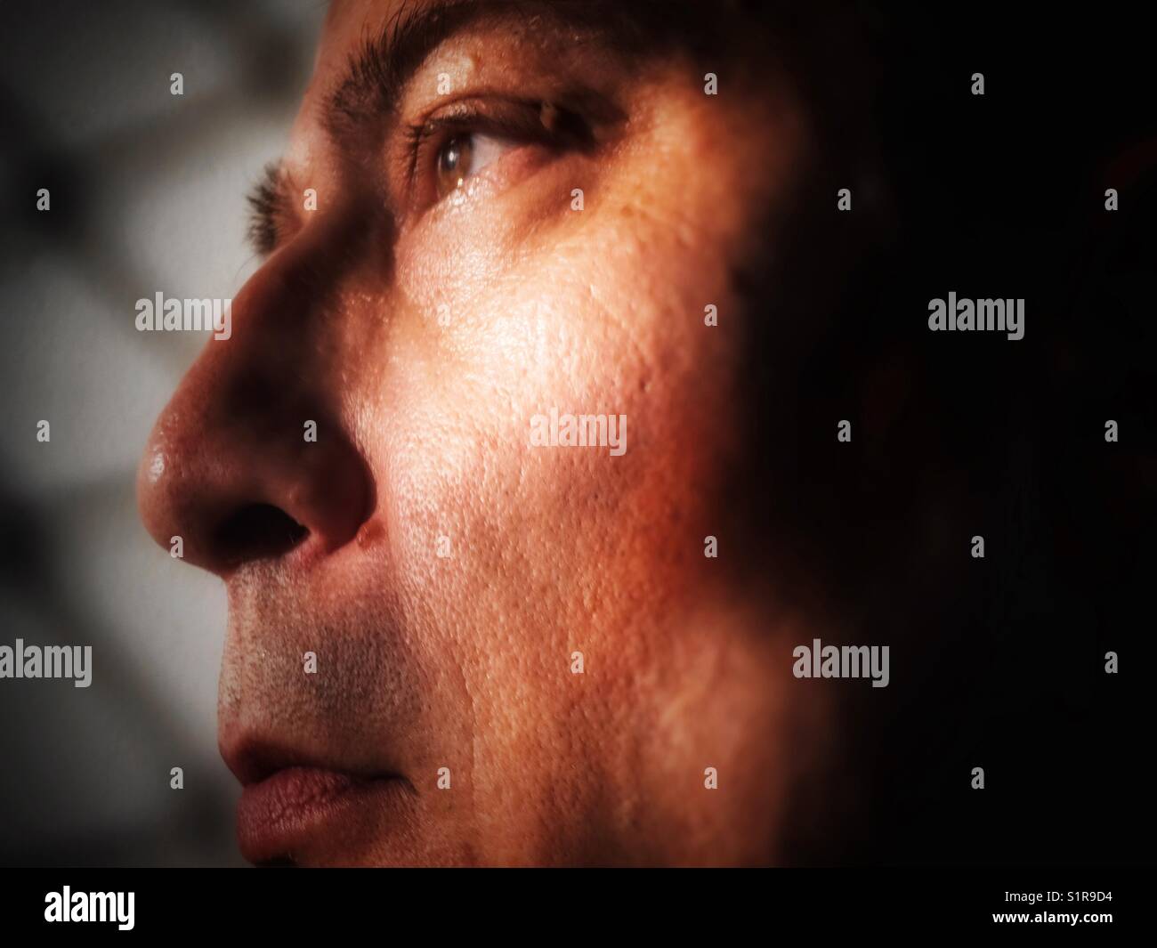 Man hiding shadows hi-res stock photography and images - Alamy