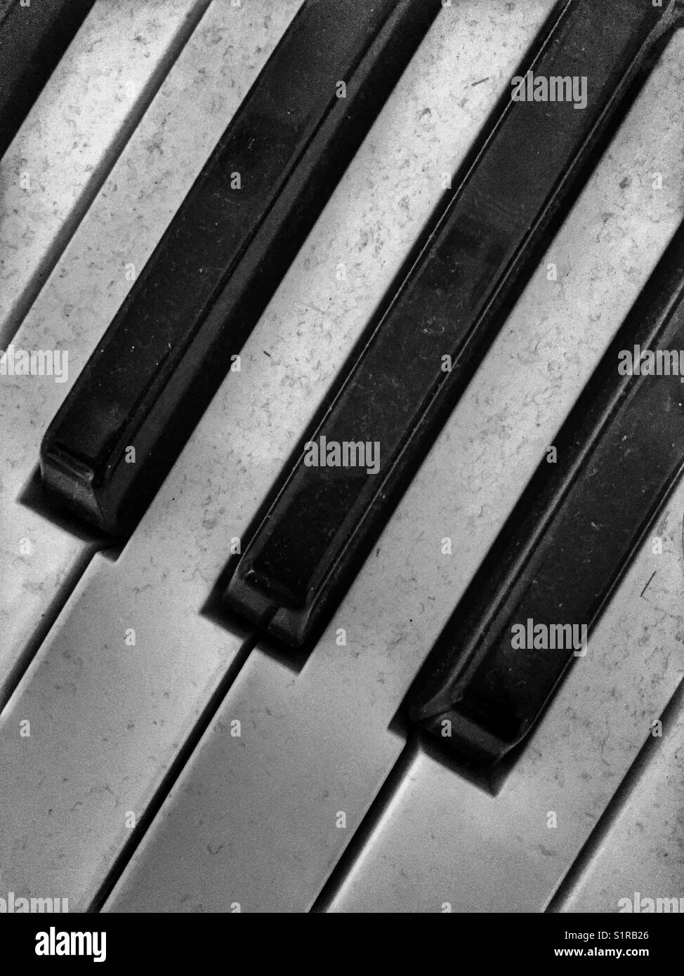 Dusty keys on a Yamaha keyboard Stock Photo - Alamy
