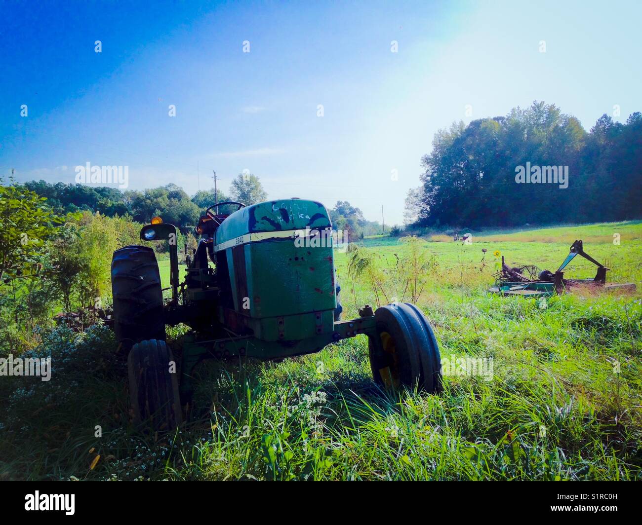 Tractor by morning Stock Photo - Alamy