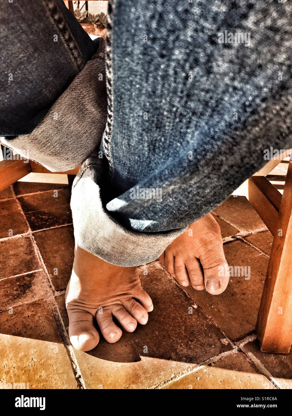 Crossed Toes Stock Photos & Crossed Toes Stock Images - Alamy