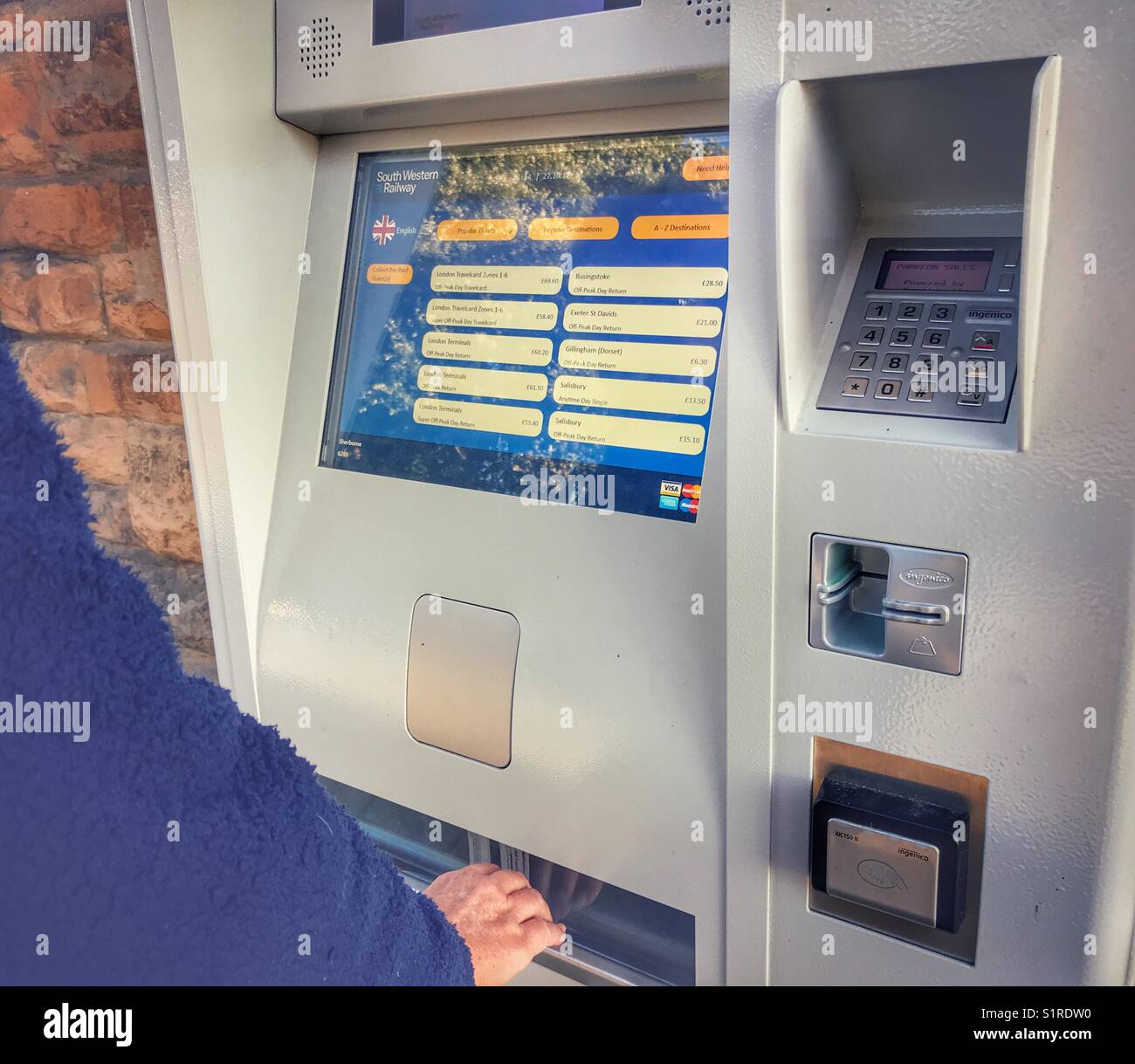 Train collecting tickets hi-res stock photography and images - Alamy