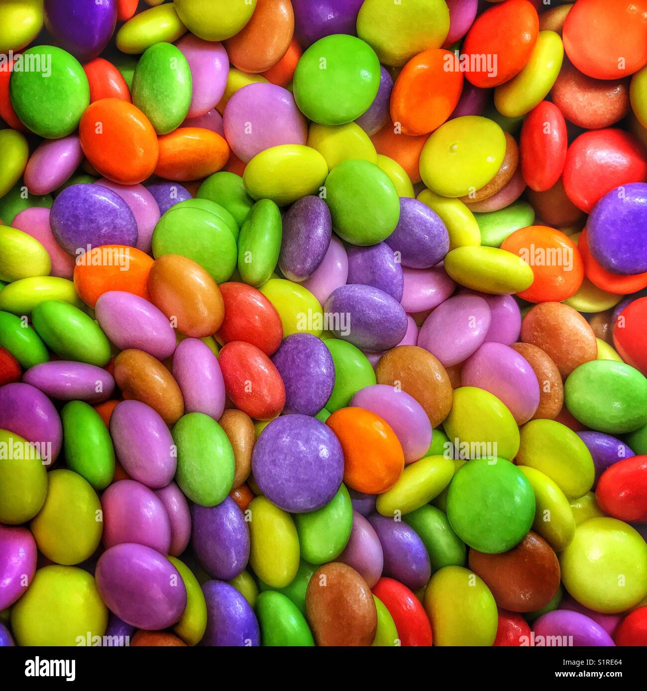 Coloured sweets smarties hi-res stock photography and images - Alamy