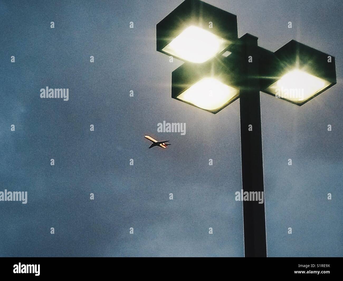 Airplane approaching La Guardia airport flying over Brooklyn, NYC Stock ...