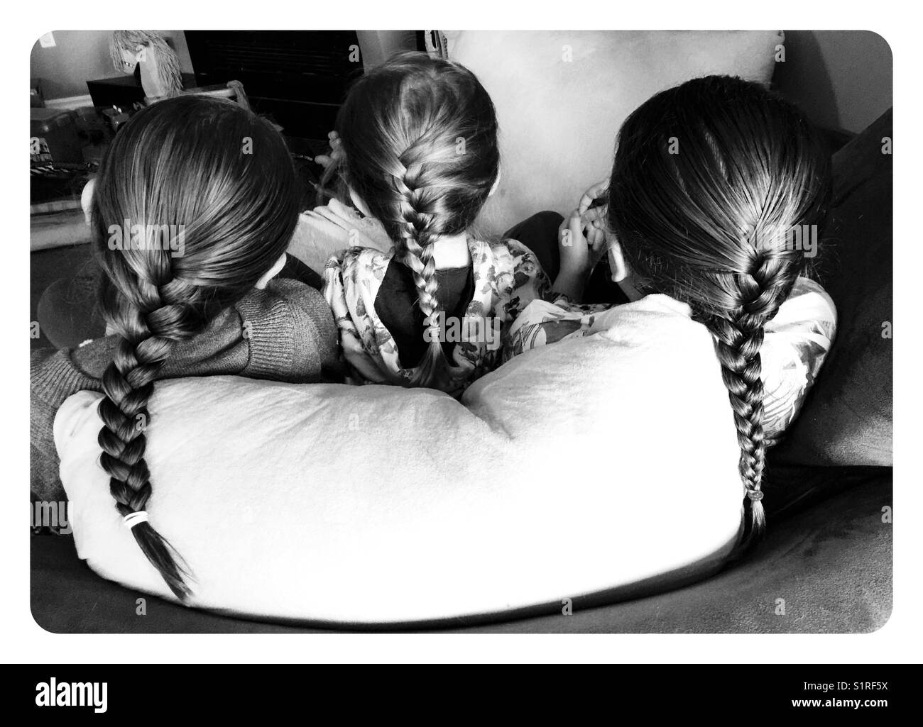 Three French braids Stock Photo - Alamy