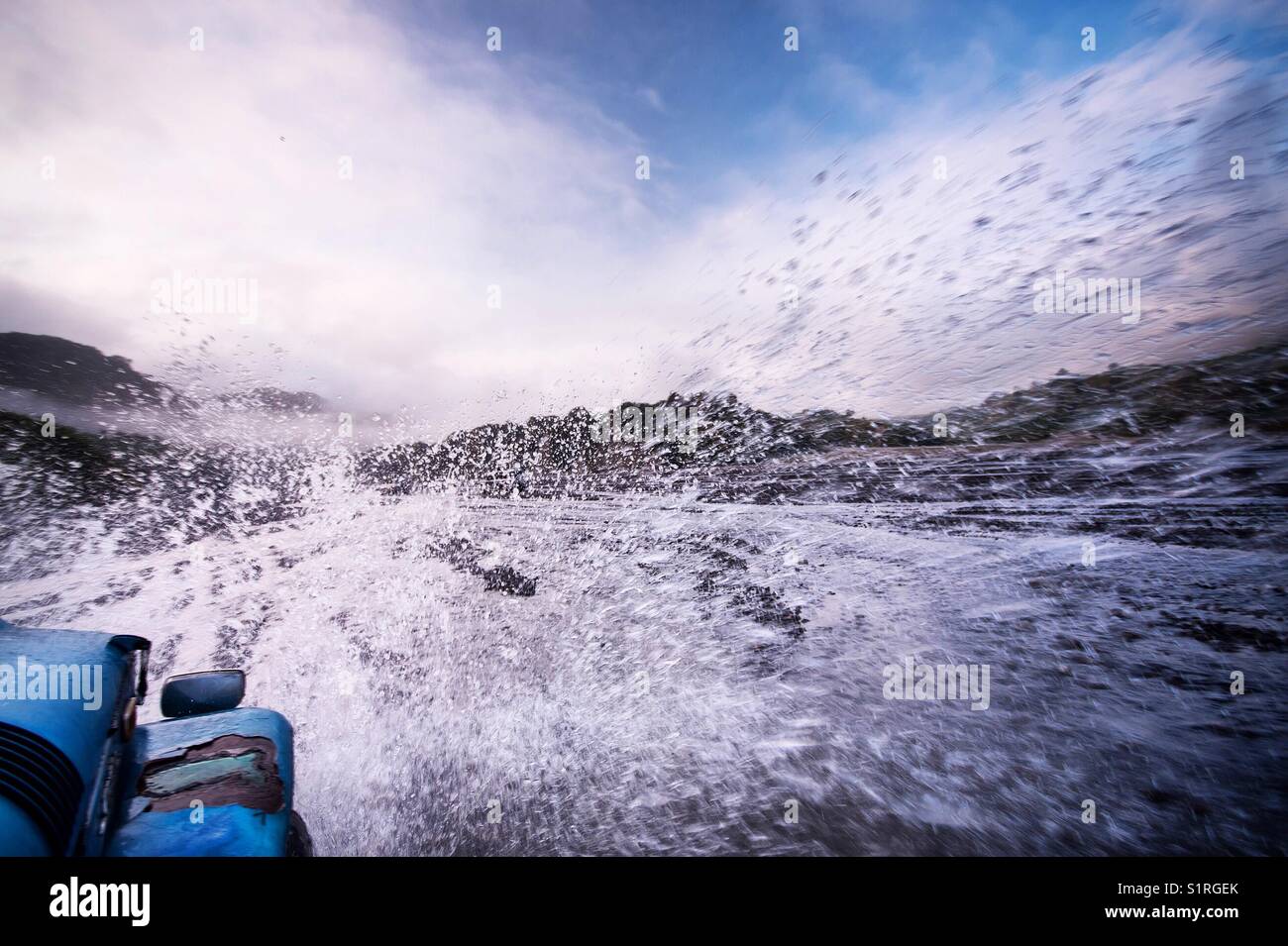 Water splash on road hi-res stock photography and images - Alamy