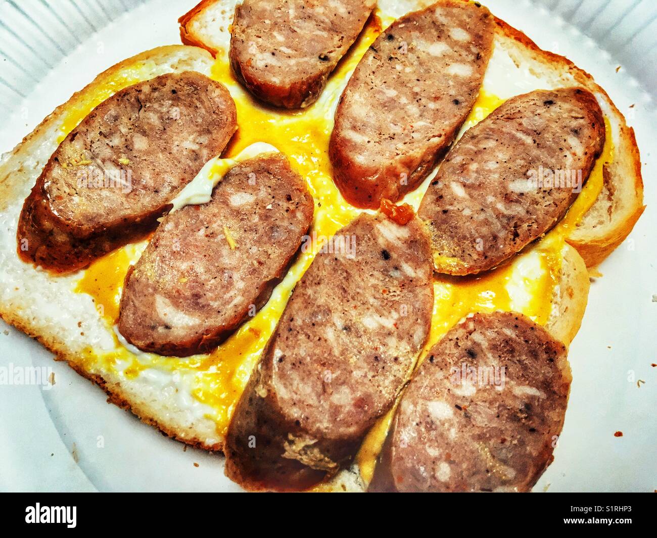 Cold sausage sandwich Stock Photo - Alamy