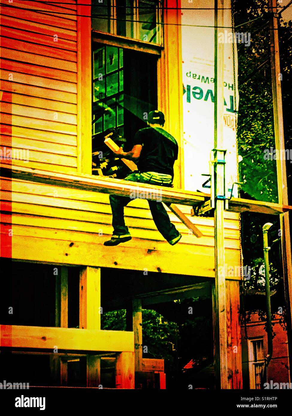 Super saturated construction worker Stock Photo - Alamy