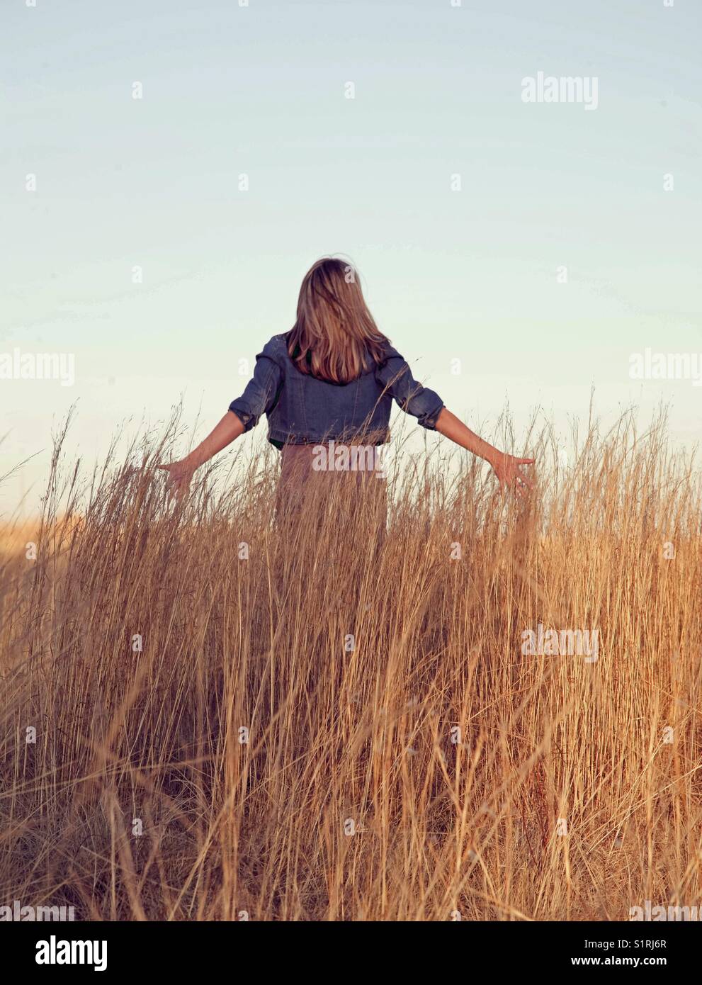 Happy lady grass hi-res stock photography and images - Alamy