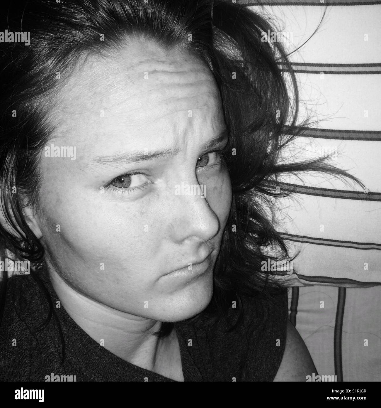 Serious woman portrait moody hi-res stock photography and images - Alamy
