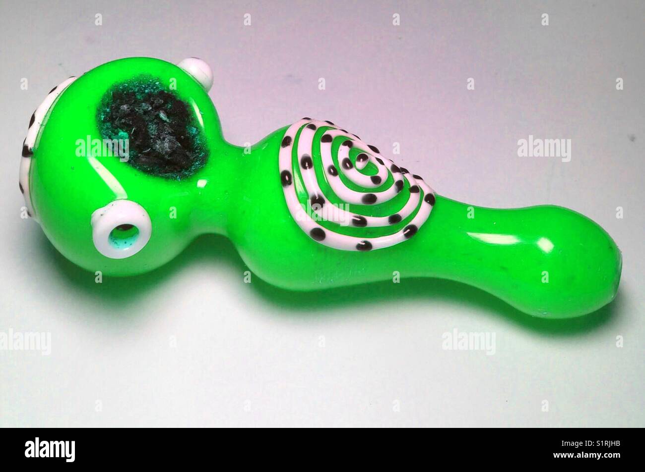 Neon green art glass pipe Stock Photo - Alamy