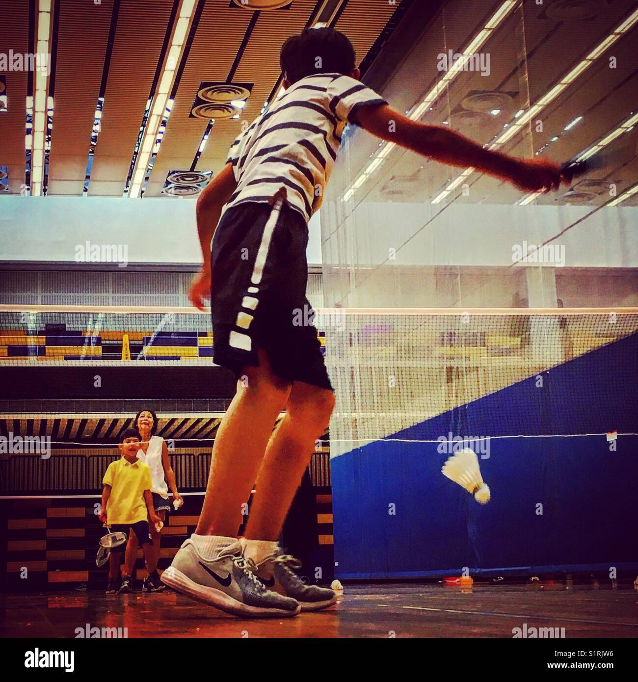 Familly playing badmington together Stock Photo - Alamy