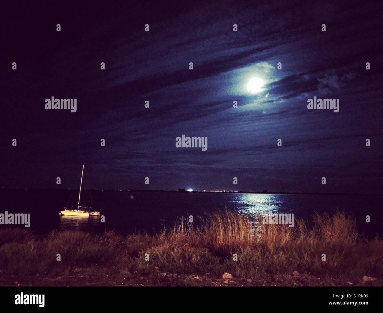 Moon & Boat Stock Photo - Alamy