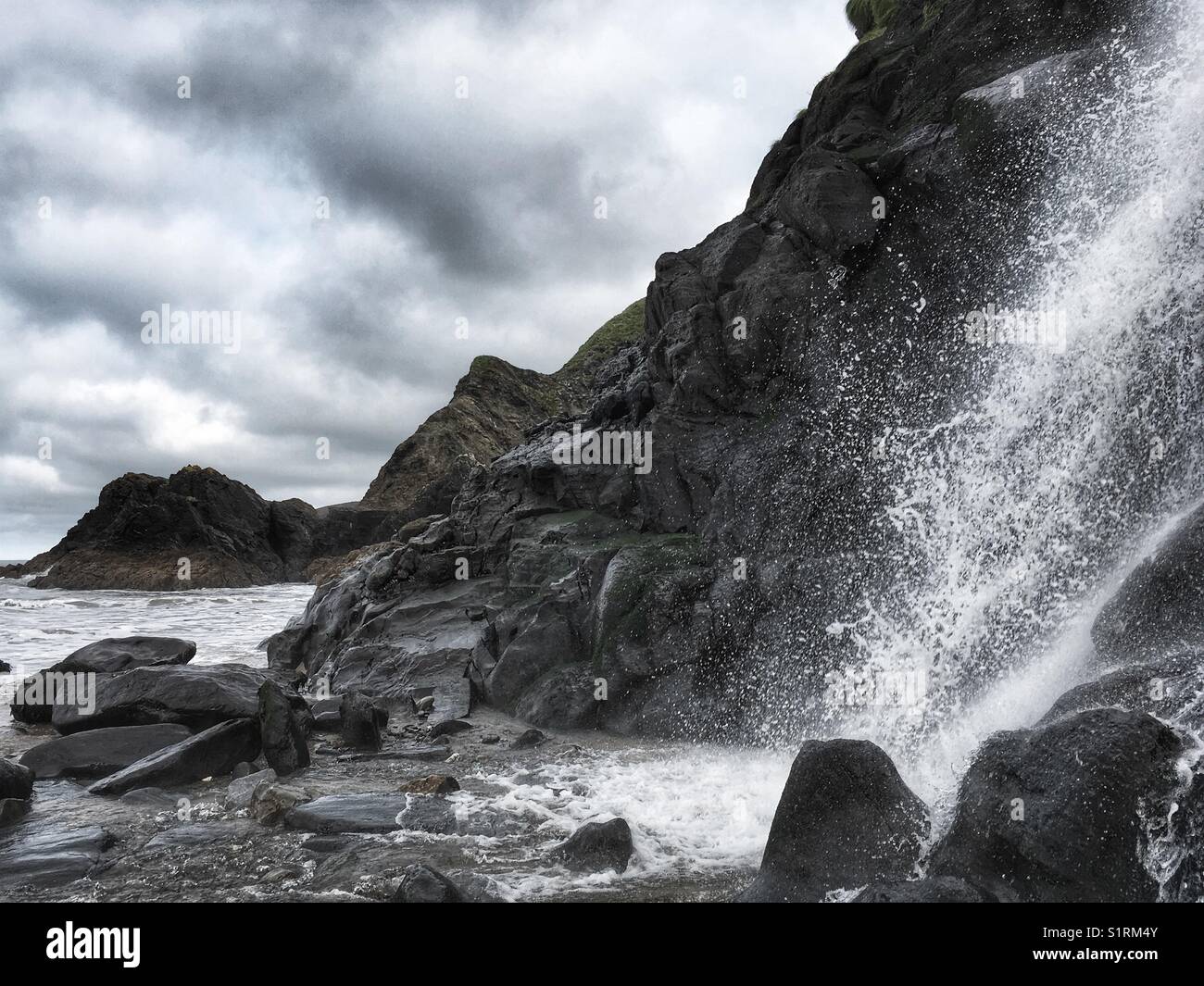 Tresaith beach waterfall hi-res stock photography and images - Alamy