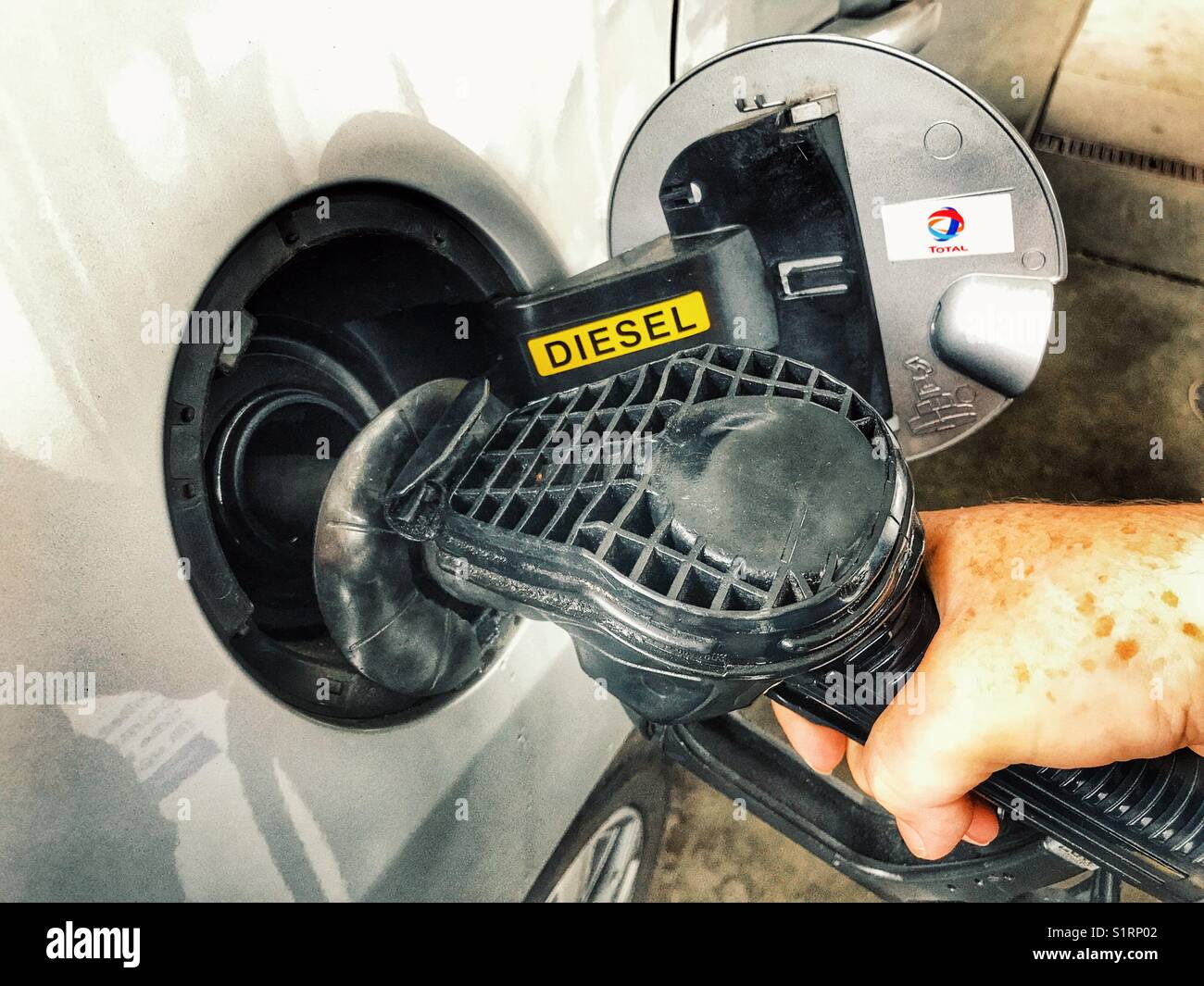 Filling diesel at the gas station Stock Photo - Alamy
