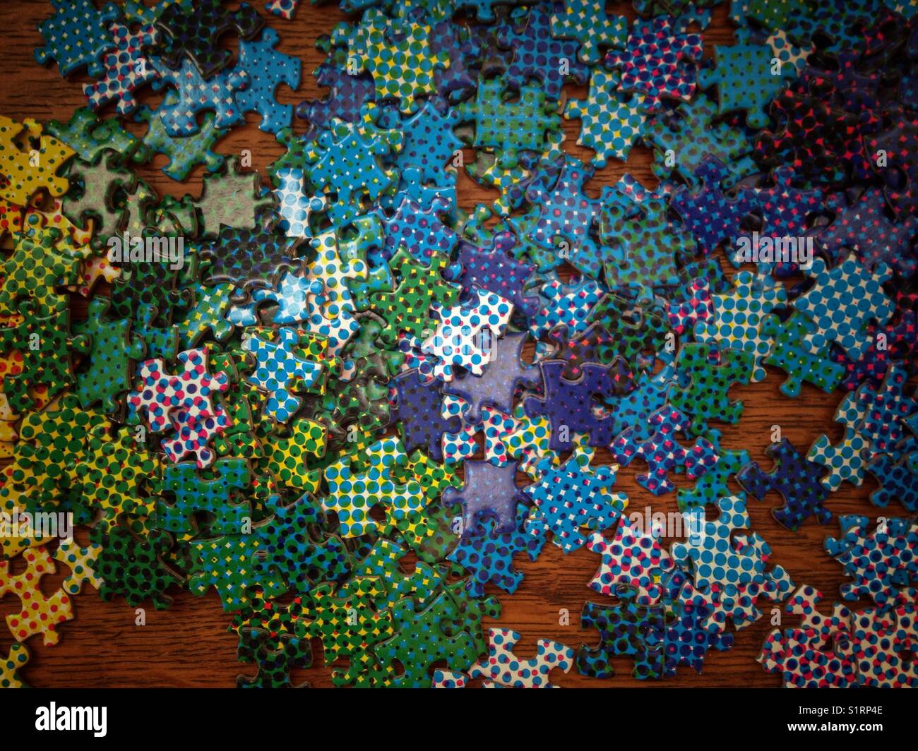 Pile of jigsaw puzzle pieces hi-res stock photography and images - Alamy