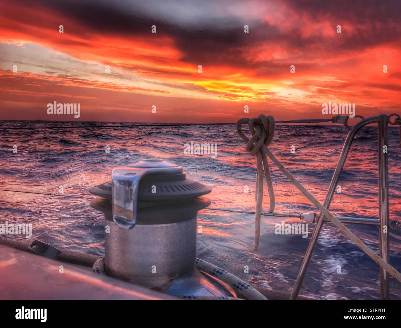 Sunrise at sea from a sailing boat Stock Photo - Alamy